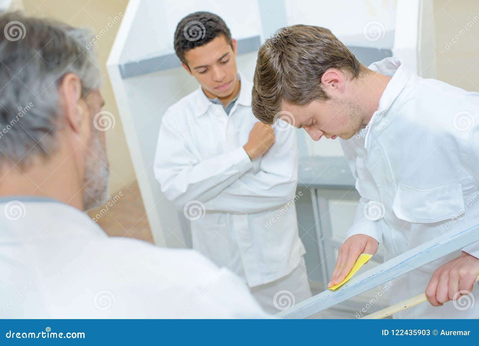 Art Student Rubbing Out Some Lines Standing Near Teacher Royalty-Free ...