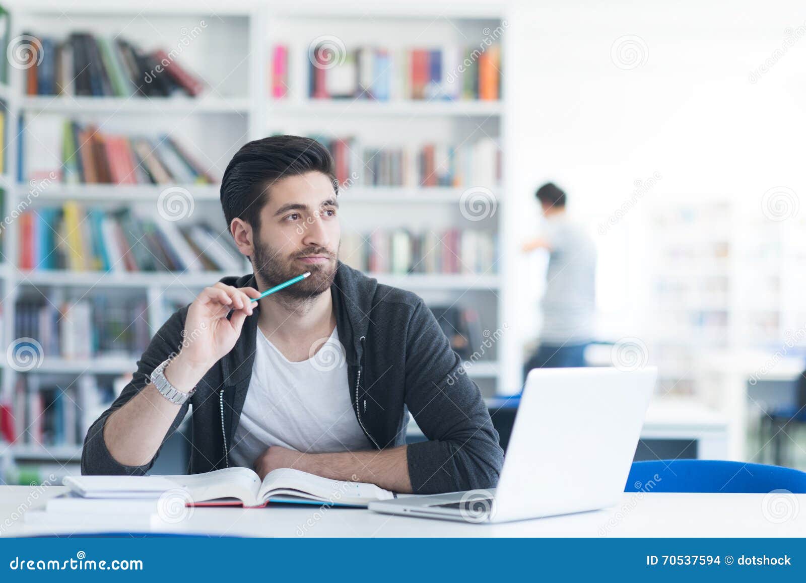 Student in School Library Using Laptop for Research Stock Photo - Image ...