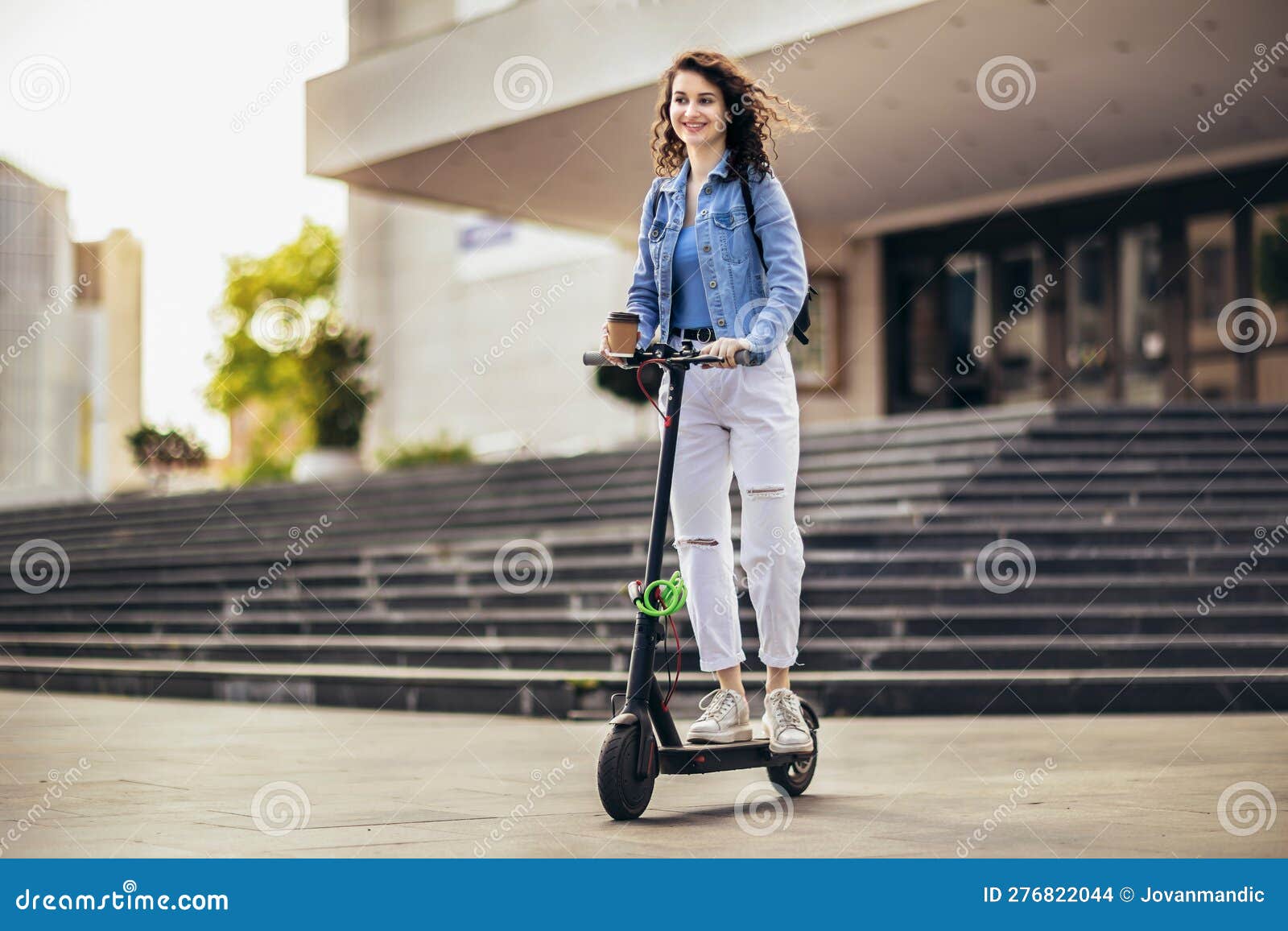 Student on scooter stock photo. Image of smilling, alone - 276822044