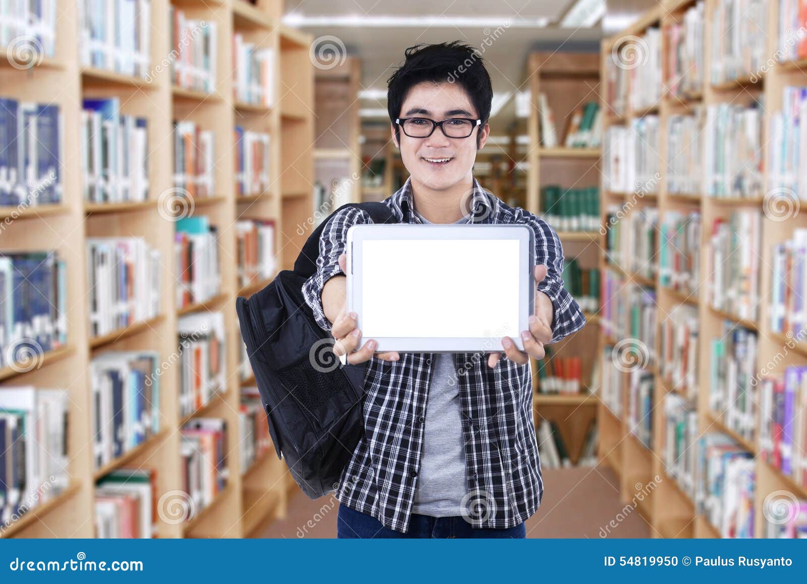 Student Showing Tablet Screen in Library Stock Photo - Image of holding ...