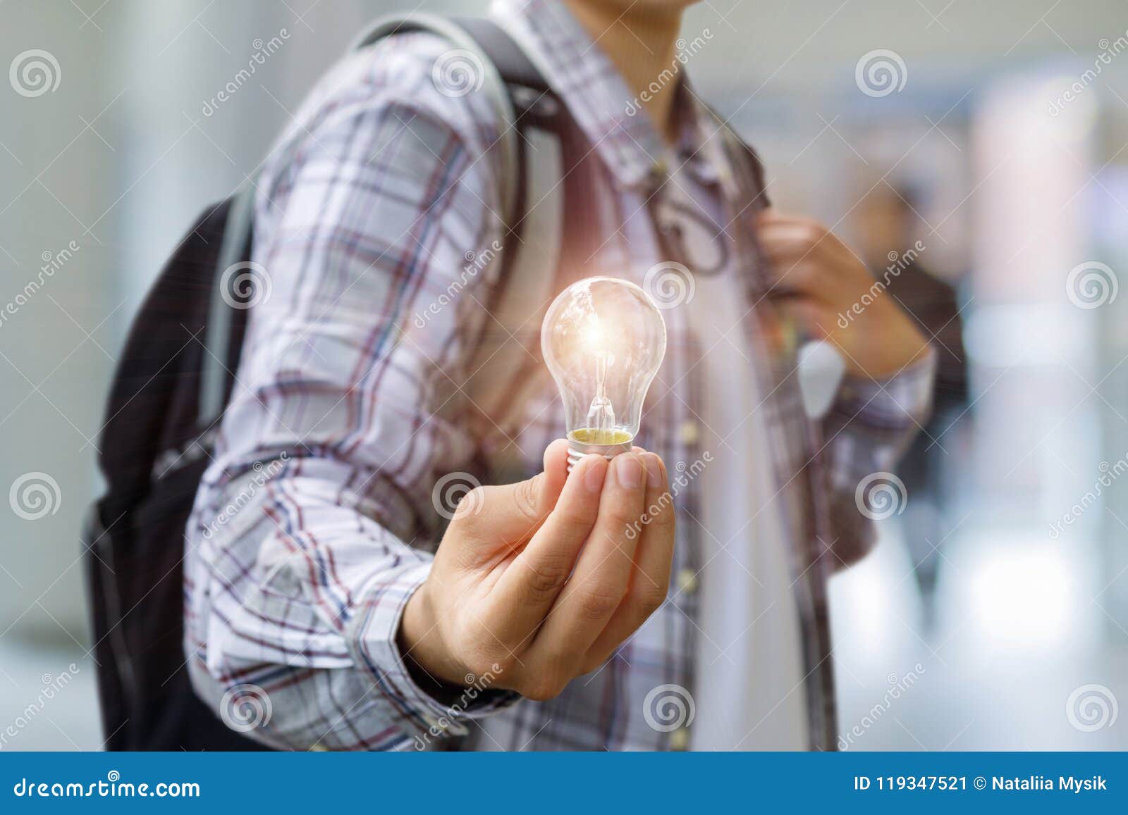 Student Shows a Burning Light Bulb. Stock Image - Image of attractive ...
