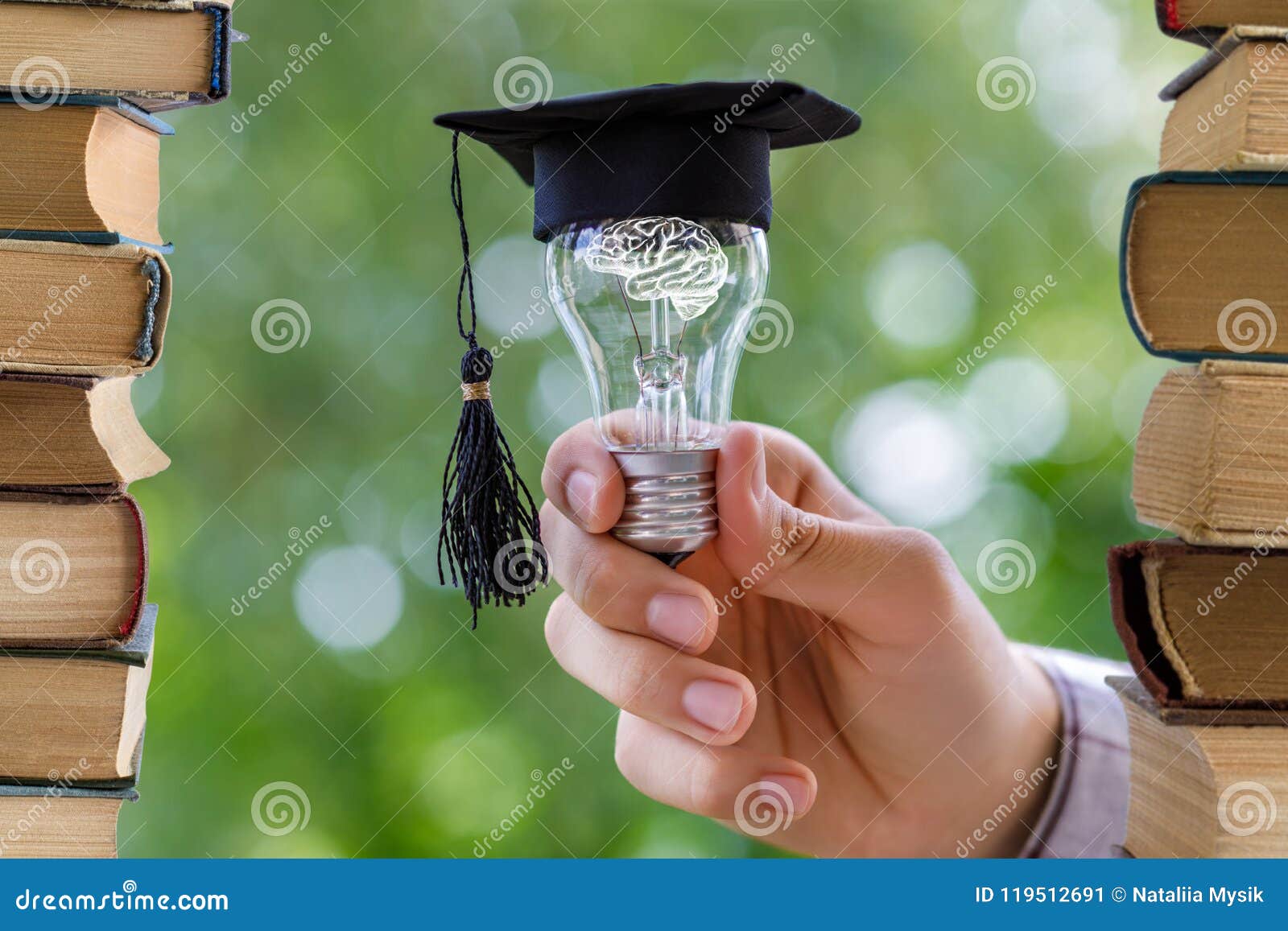 Student Shows Light Bulb In The Cap Academic . Stock Image - Image of ...