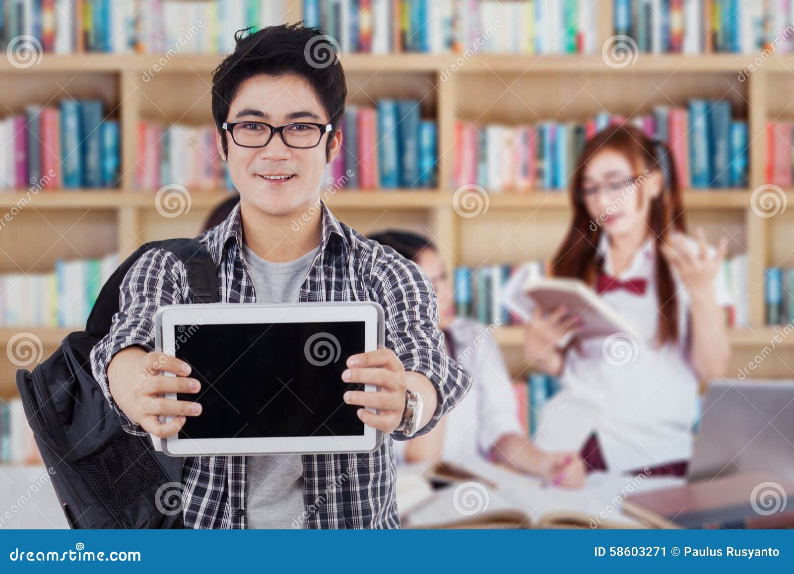 Student Shows Tablet in the Library Stock Image - Image of academic ...