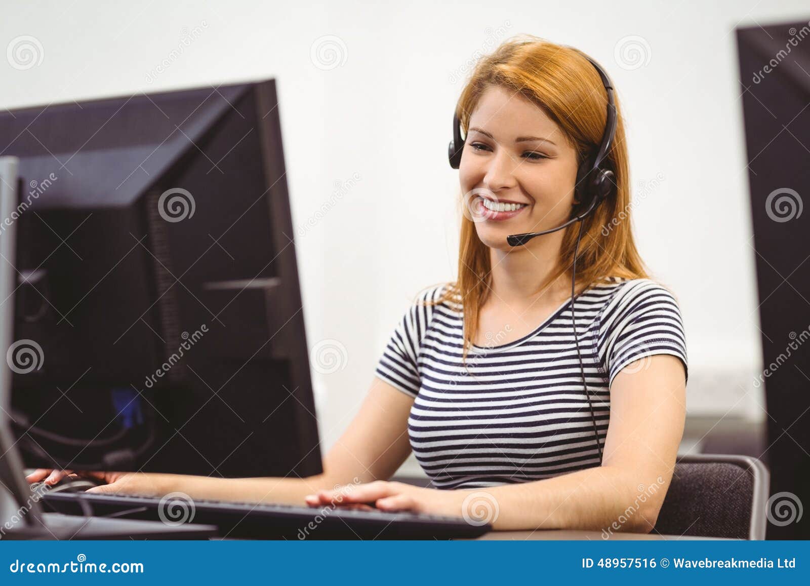 Student Sitting at the Computer Room Wearing Headset Stock Photo ...