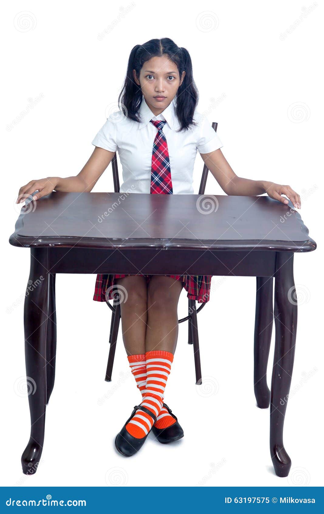Student sitting at a desk stock image. Image of asian - 63197575