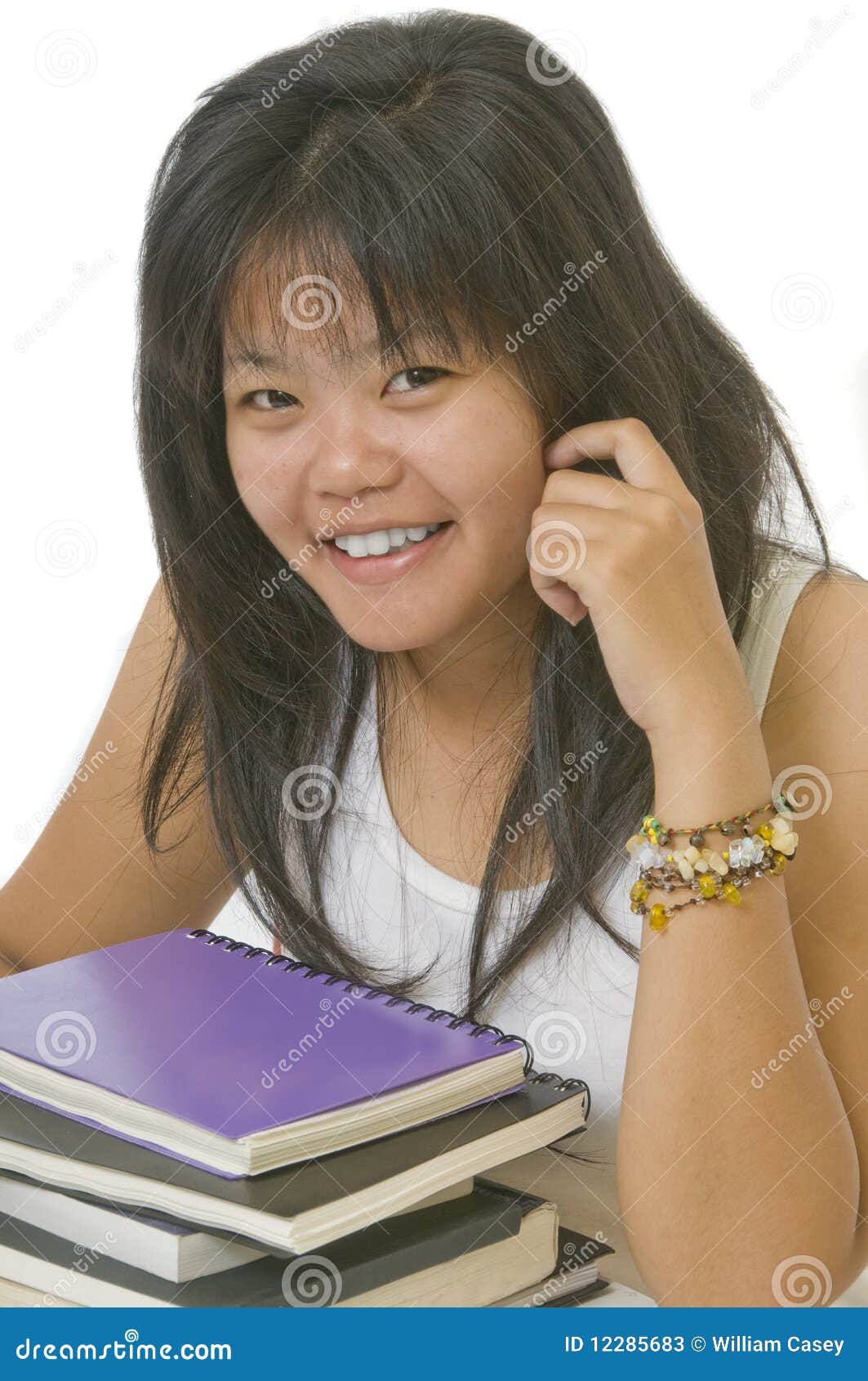 Student Sitting Down at Desk and Doing Homework Stock Image - Image of ...
