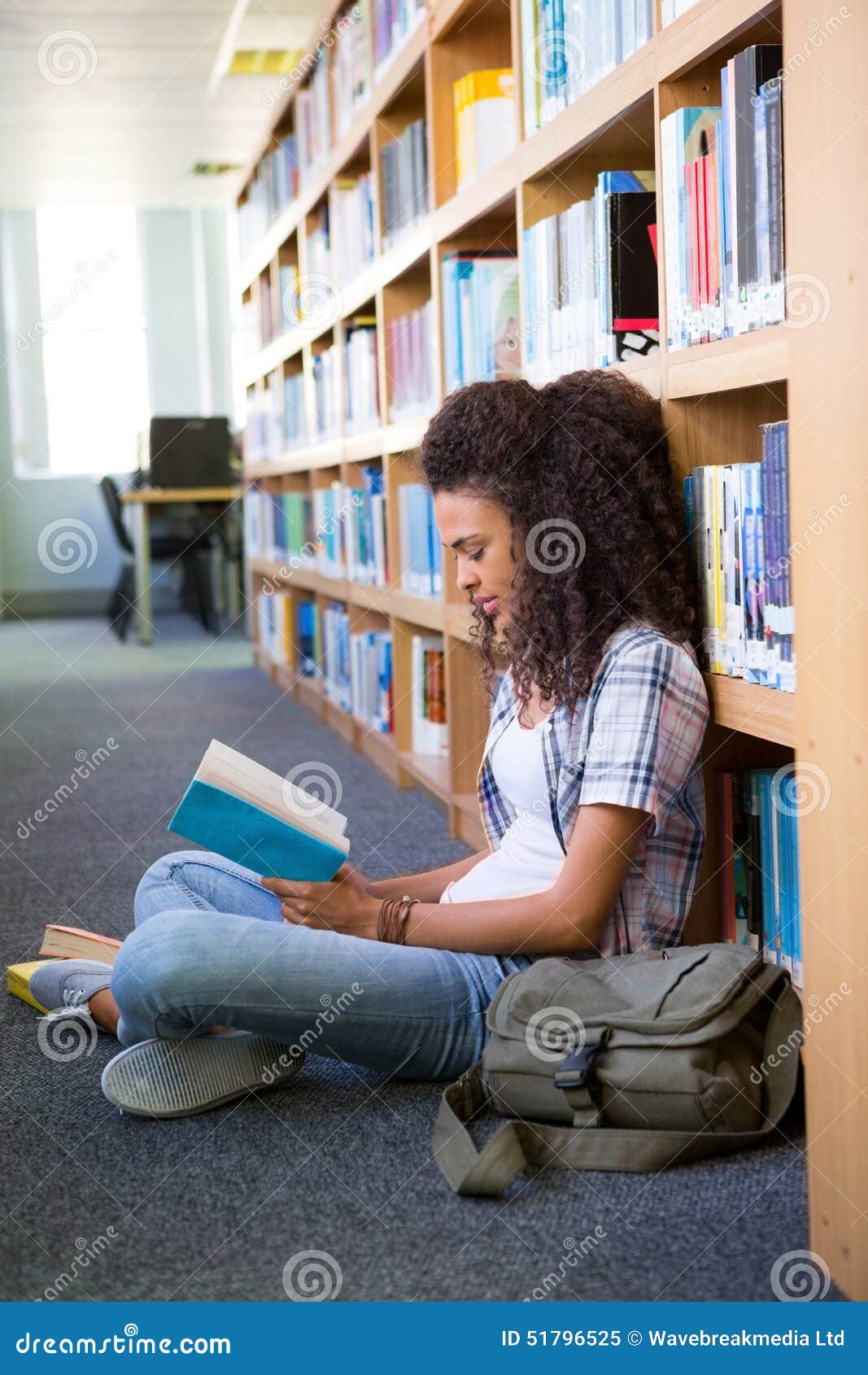Student Sitting on Floor in Library Reading Stock Image - Image of ...