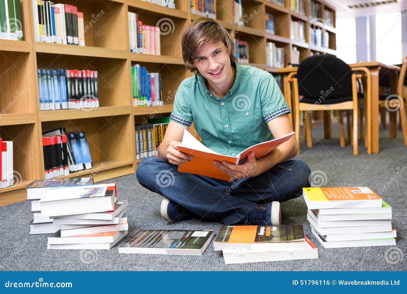 Student Sitting on Floor in Library Stock Photo - Image of person ...