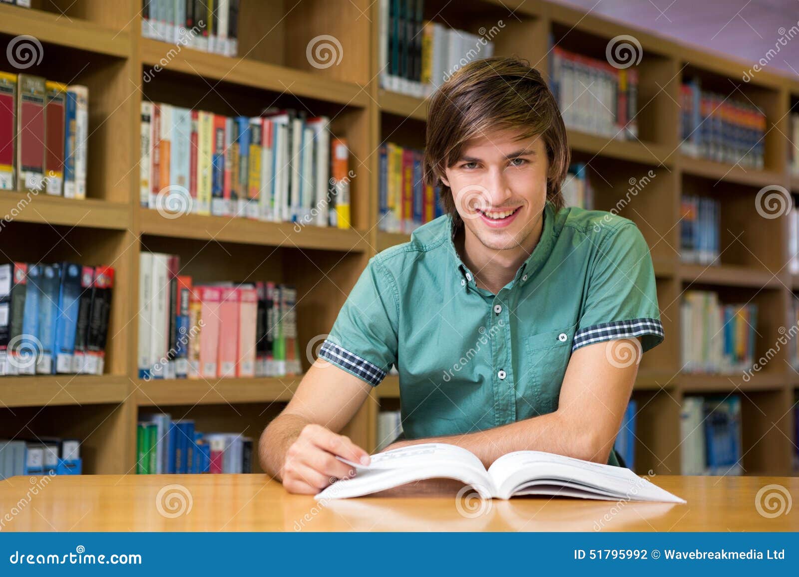 Student Sitting in Library Reading Stock Photo - Image of adult, person ...