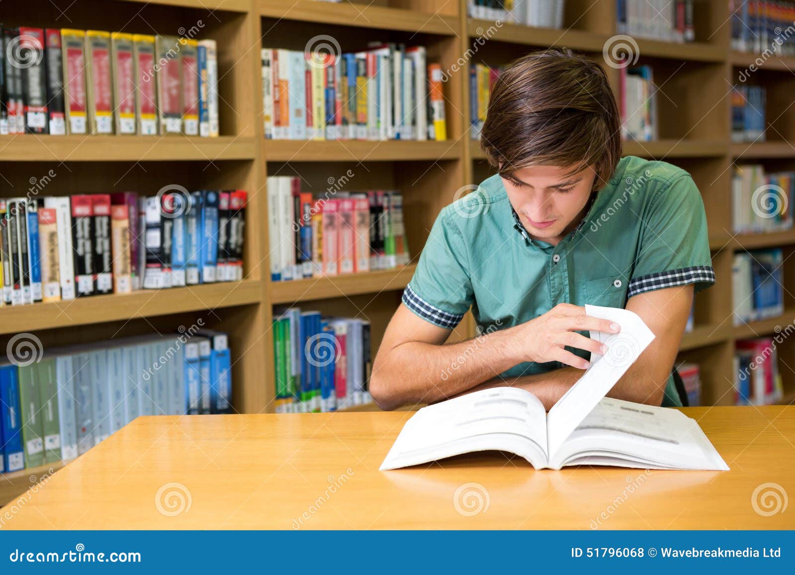 Student Sitting in Library Reading Stock Photo - Image of thoughtful ...