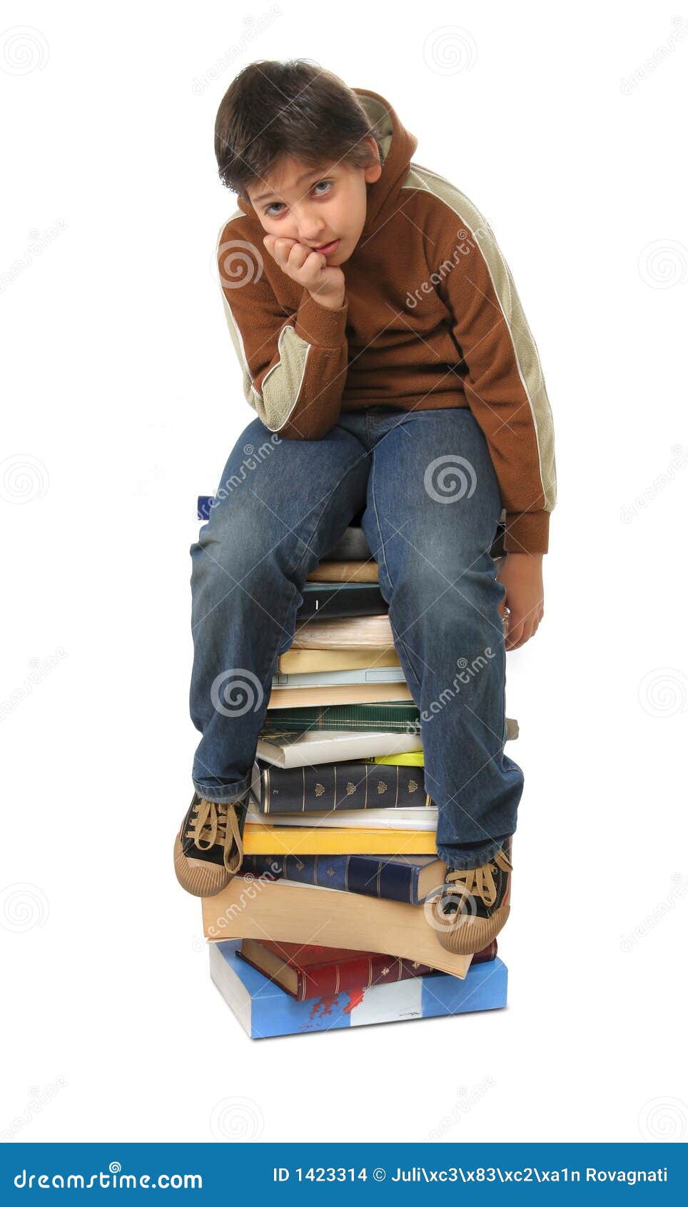 Student Sitting on a Pile of Books Stock Photo - Image of classwork ...