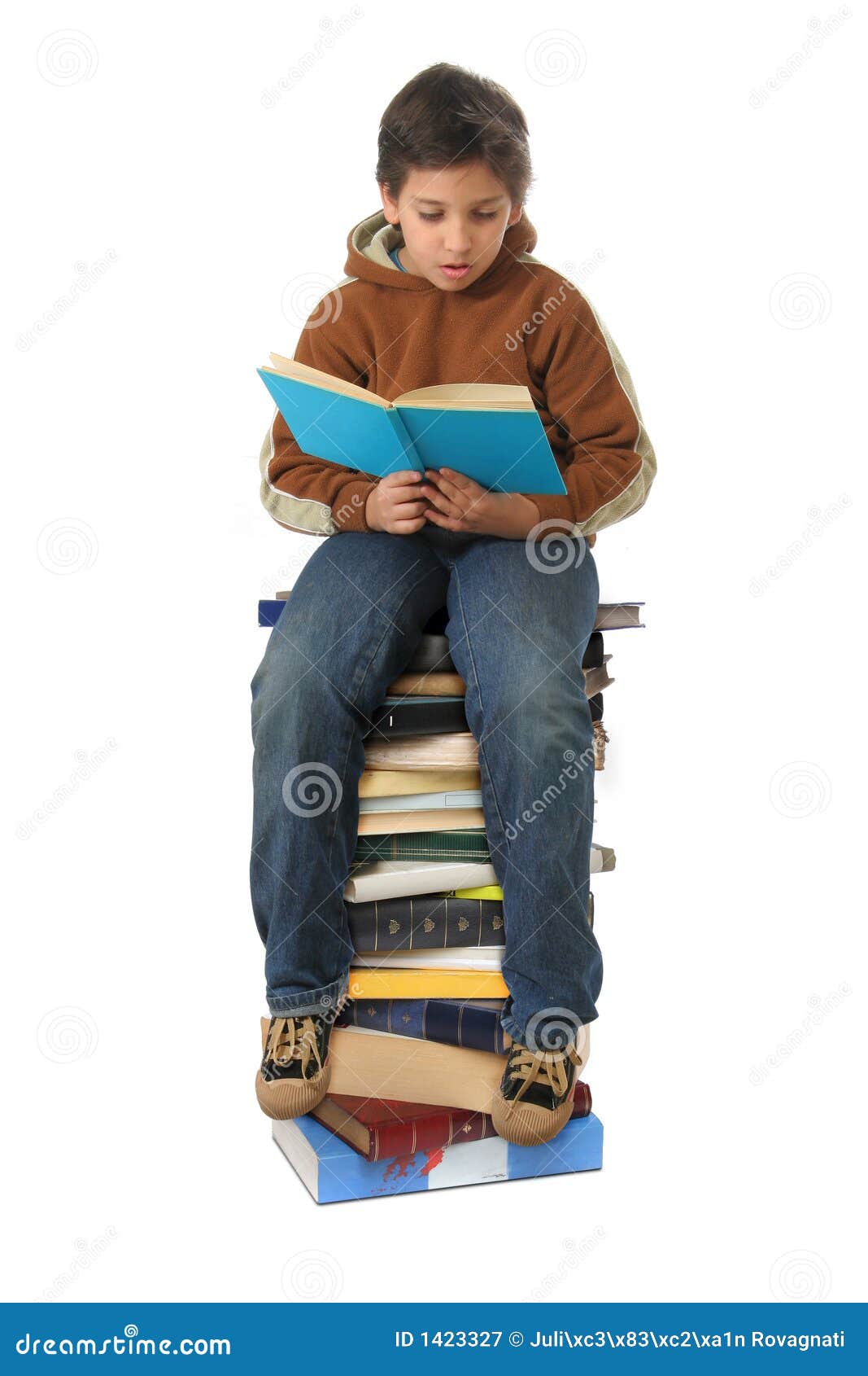 Student Sitting on a Pile of Books Stock Image - Image of body, college ...