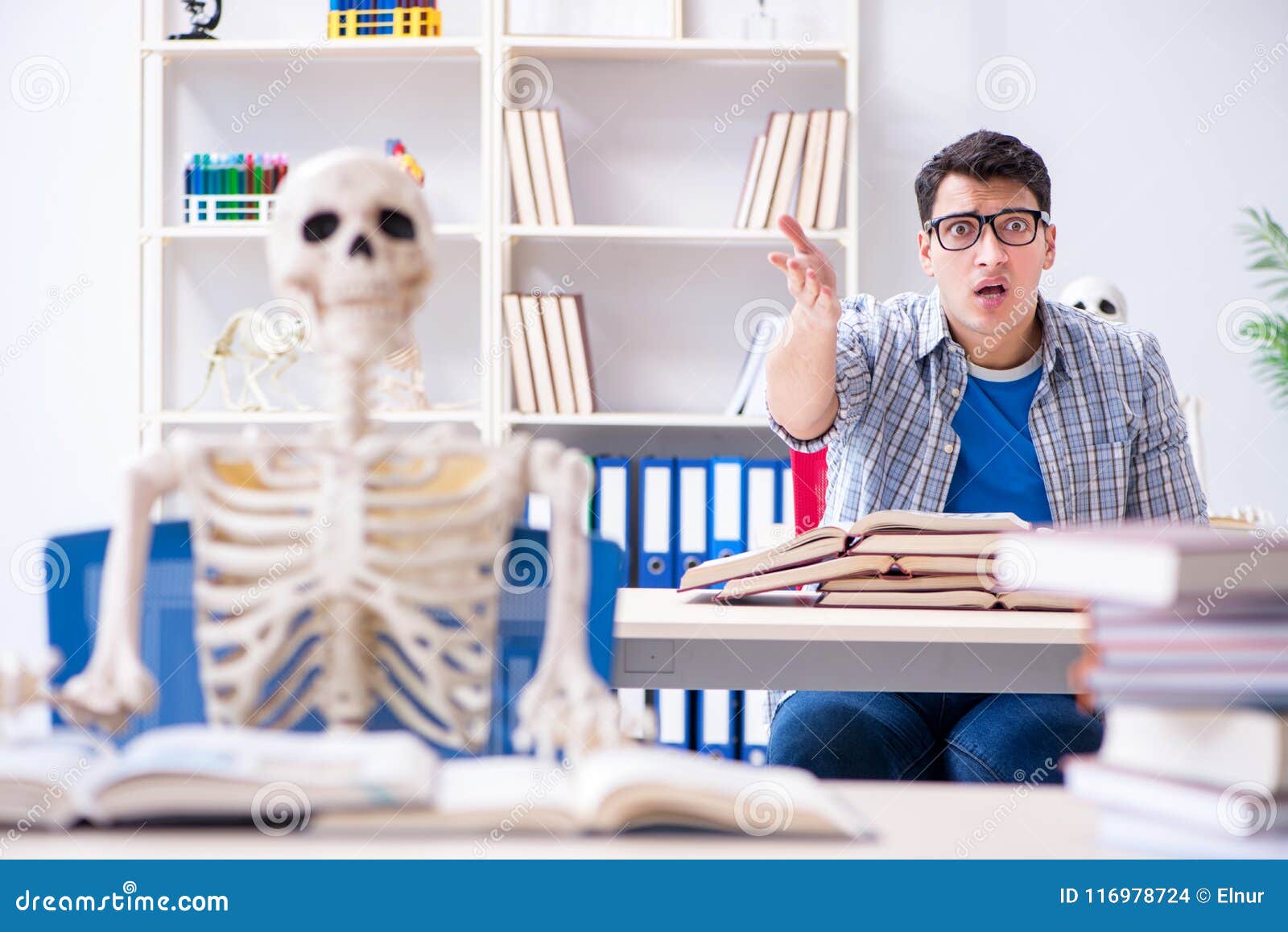 The Student Skeleton Listening To Lecture in Classroom Stock Photo ...