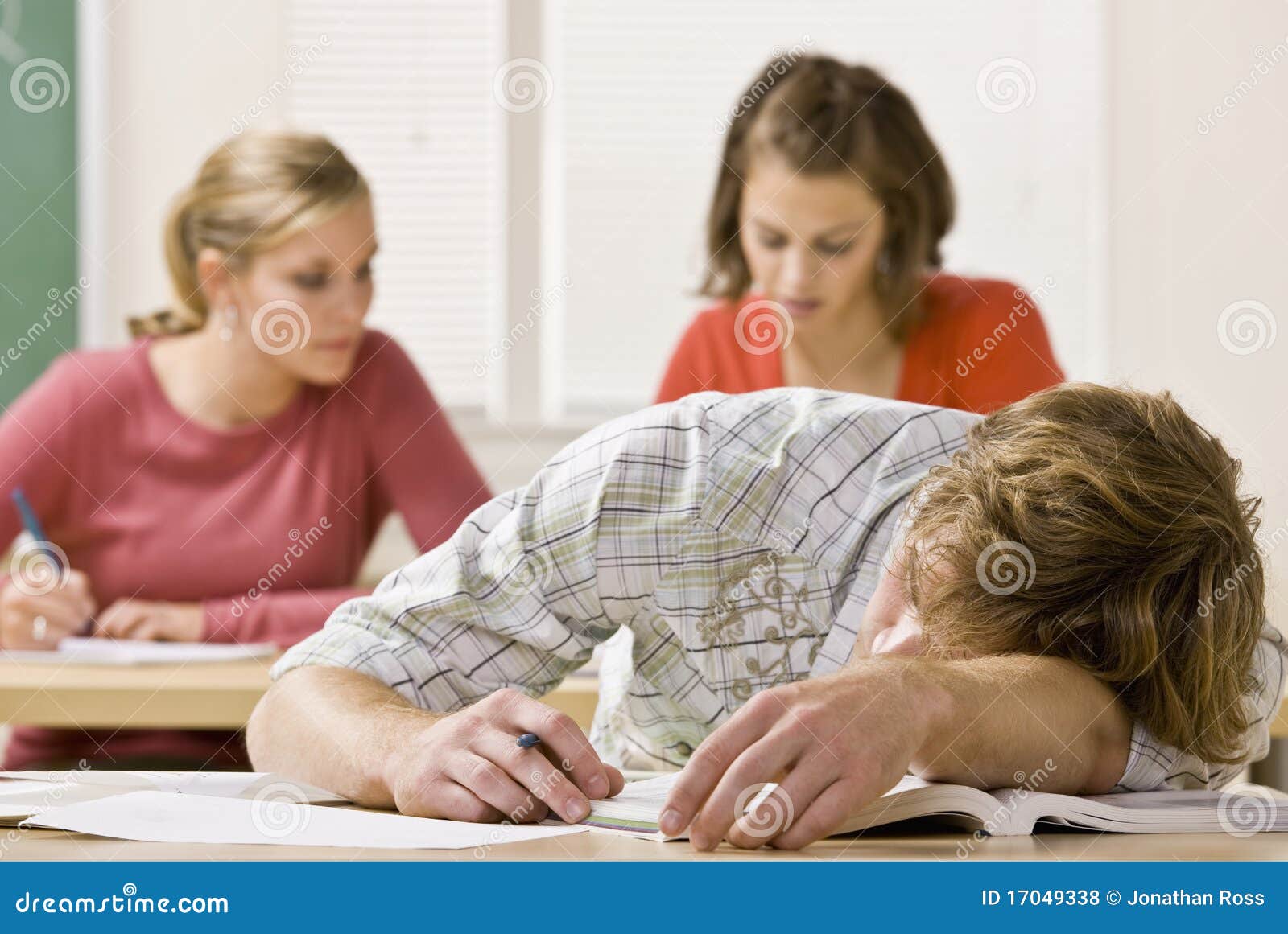 Student Sleeping at Desk in Classroom Stock Photo - Image of laying ...