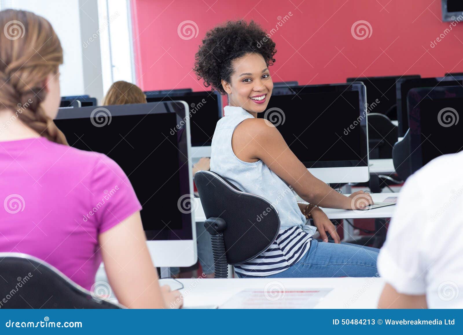 Student Smiling at Camera in Computer Class Stock Image - Image of ...