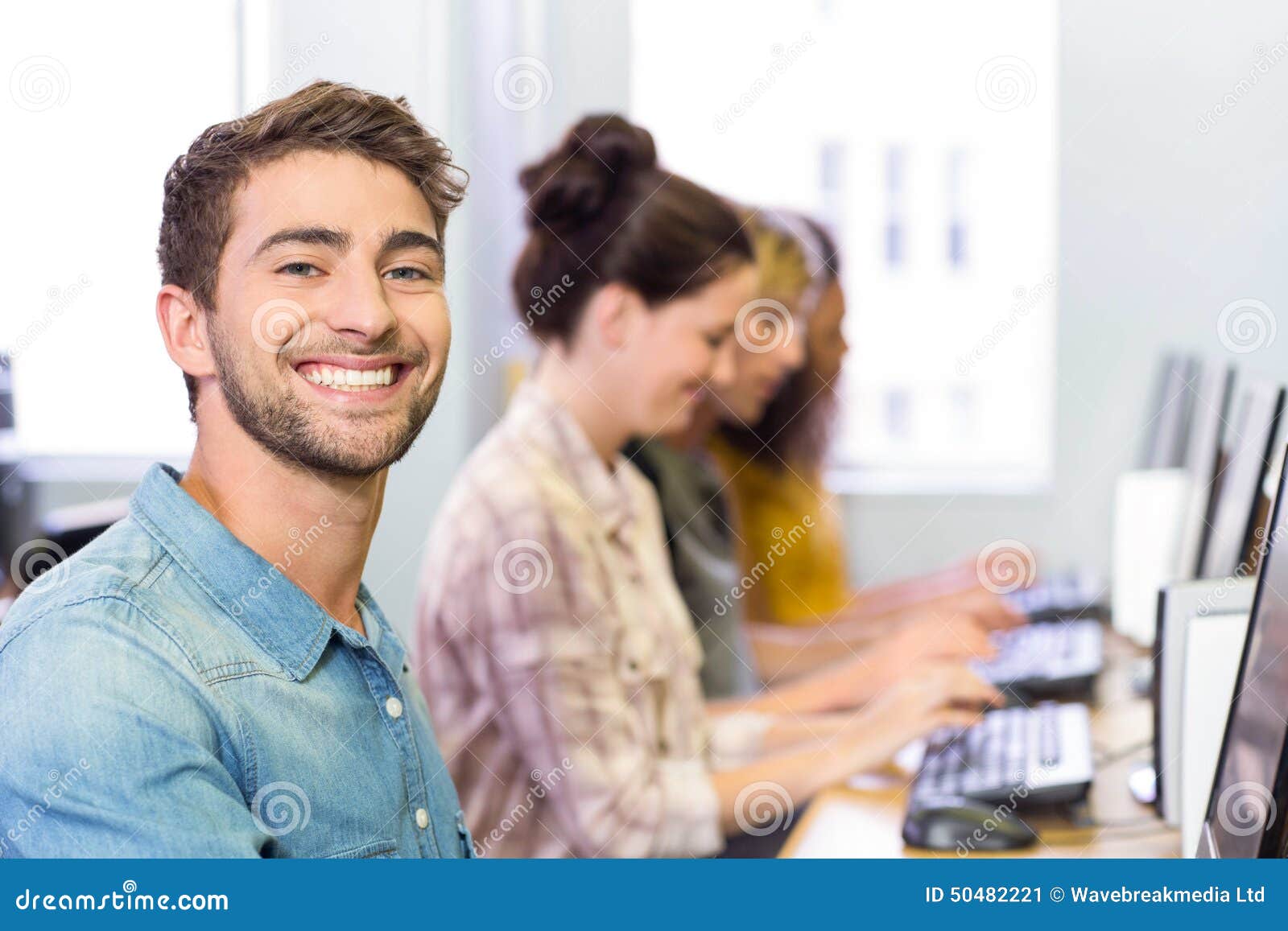 Student Smiling at Camera in Computer Class Stock Image - Image of ...