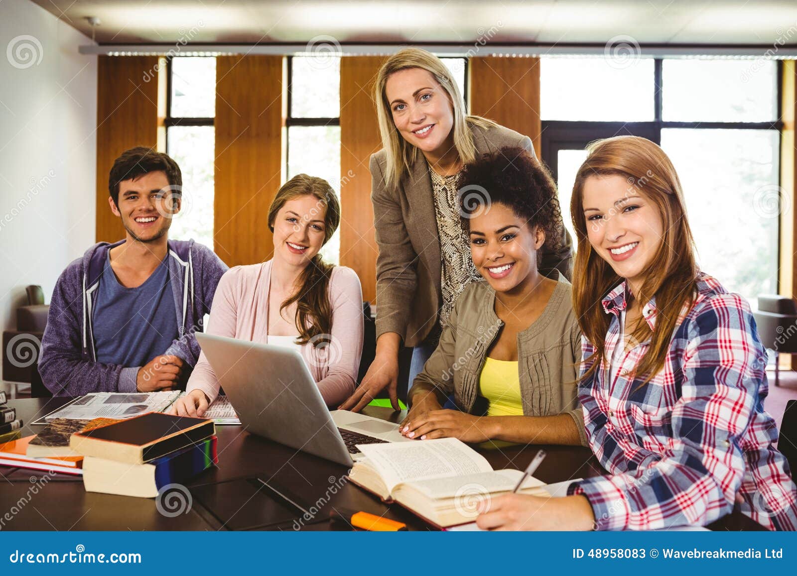 Student Smiling at the Camera with Their Teacher Stock Image - Image of ...
