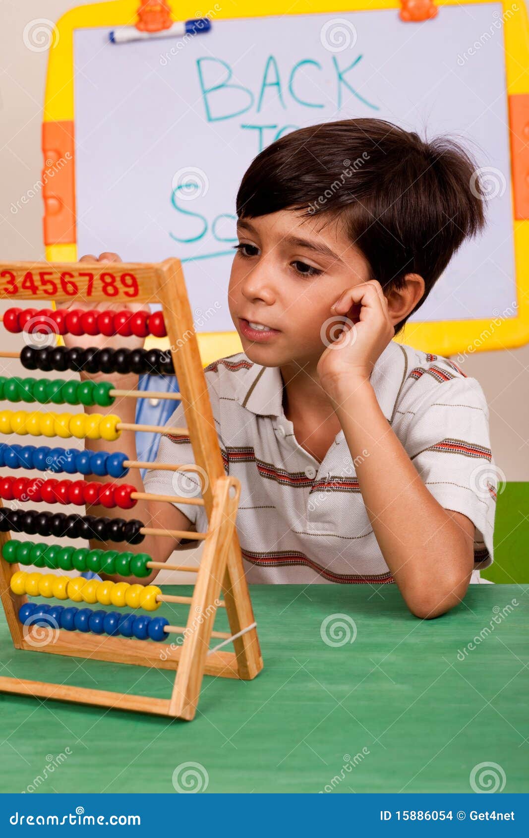 A Student Solving a Math Assignment Stock Photo - Image of preschooler ...