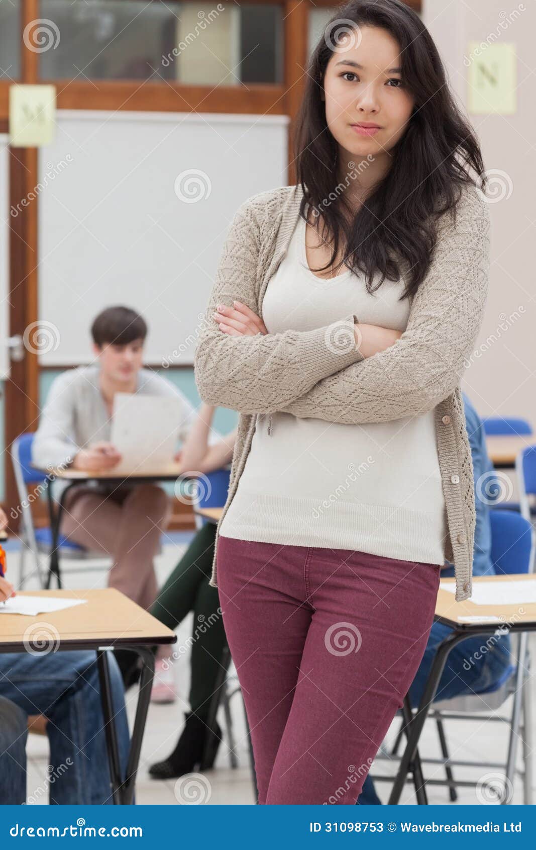 Student Standing in a Classroom Stock Image - Image of smiling, happy ...