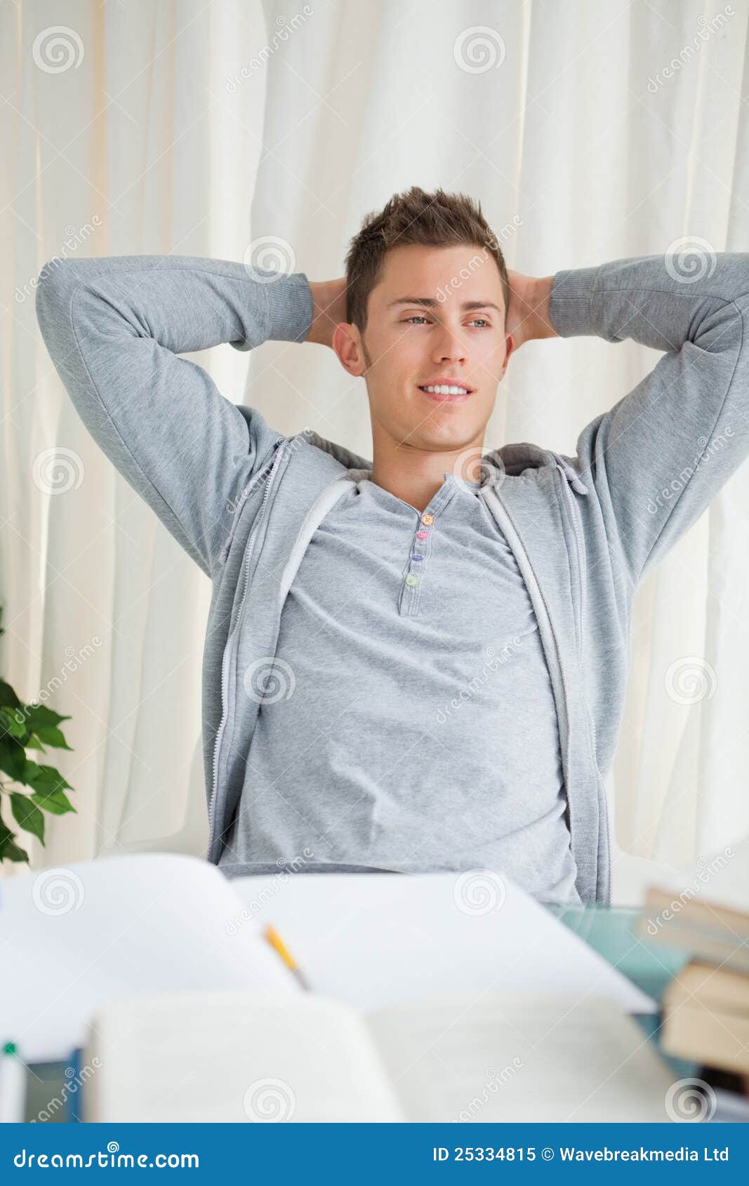 Student Stretching while Looking Away Stock Image - Image of back ...