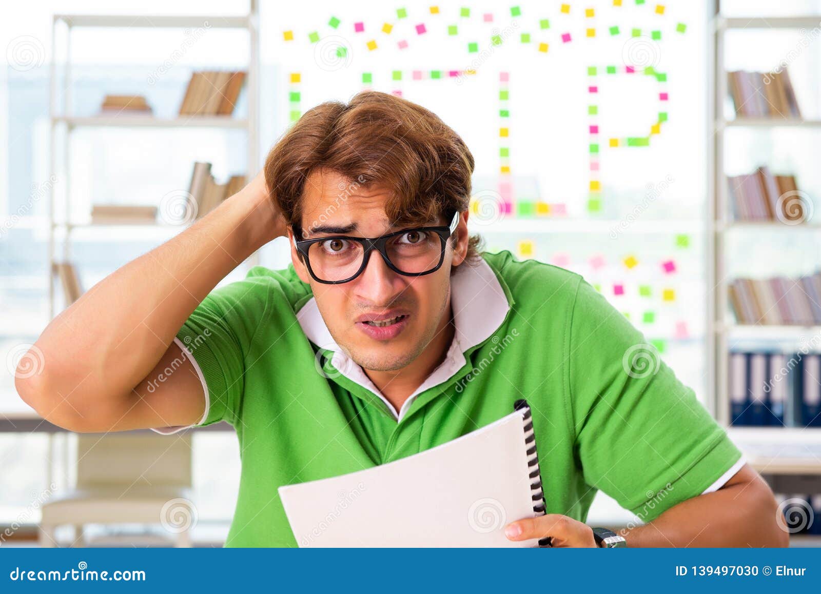 The Student Struggling at the Exam in Classroom Stock Photo - Image of ...