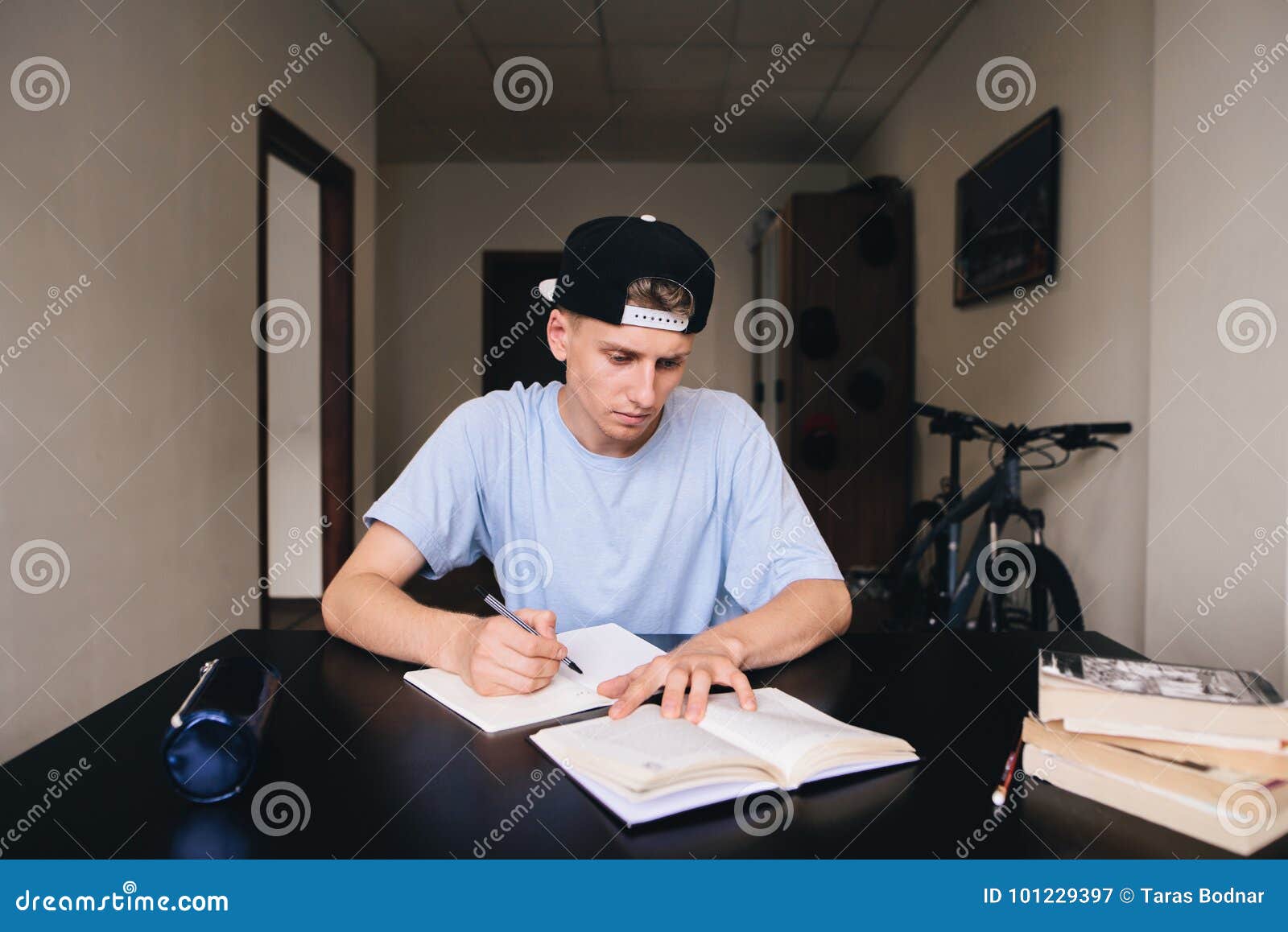 Student Studies at Home. he Carefully Records the Tasks and Answers in ...