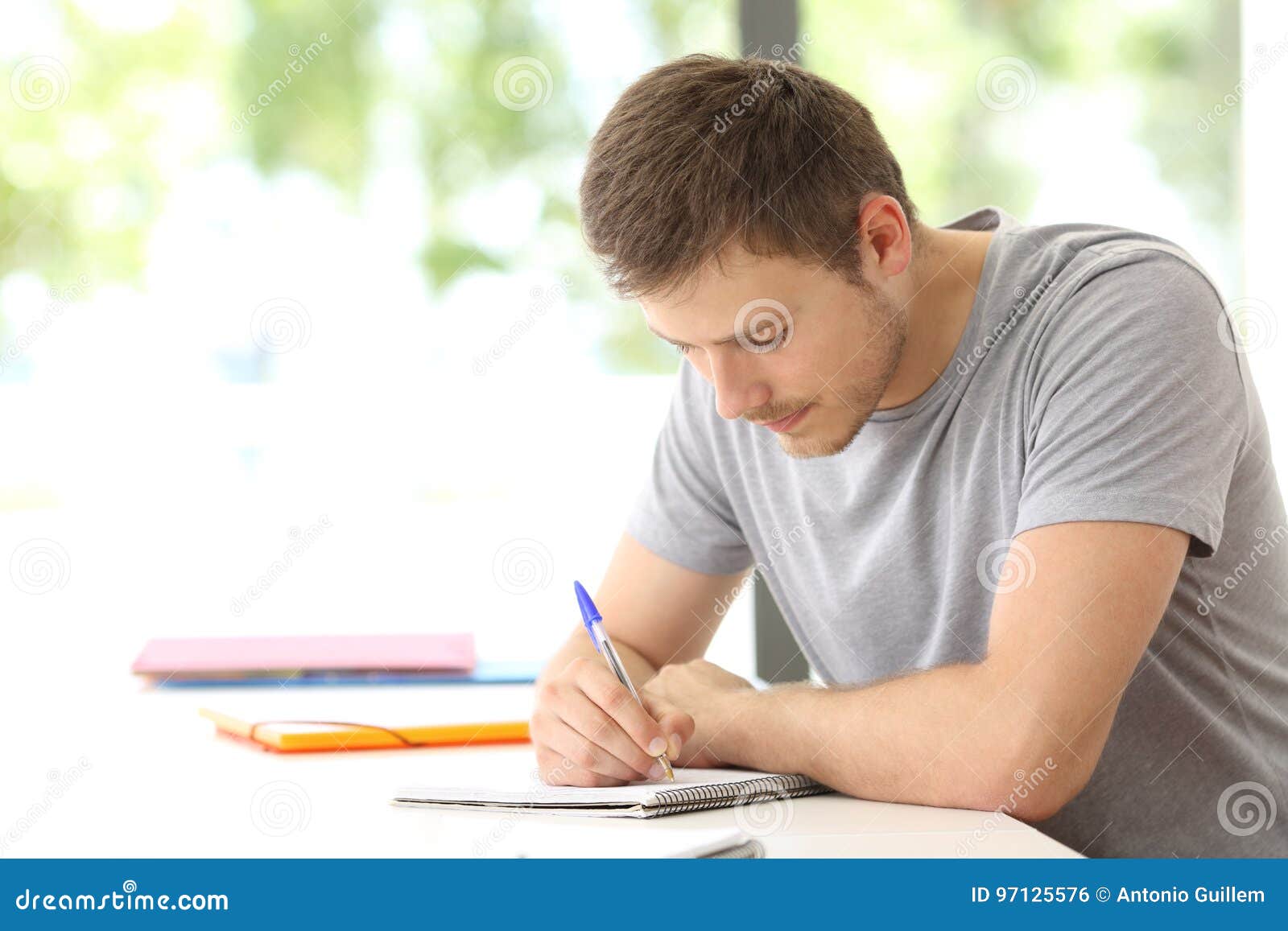 Student Studying Alone in a Classroom Stock Photo - Image of desk ...