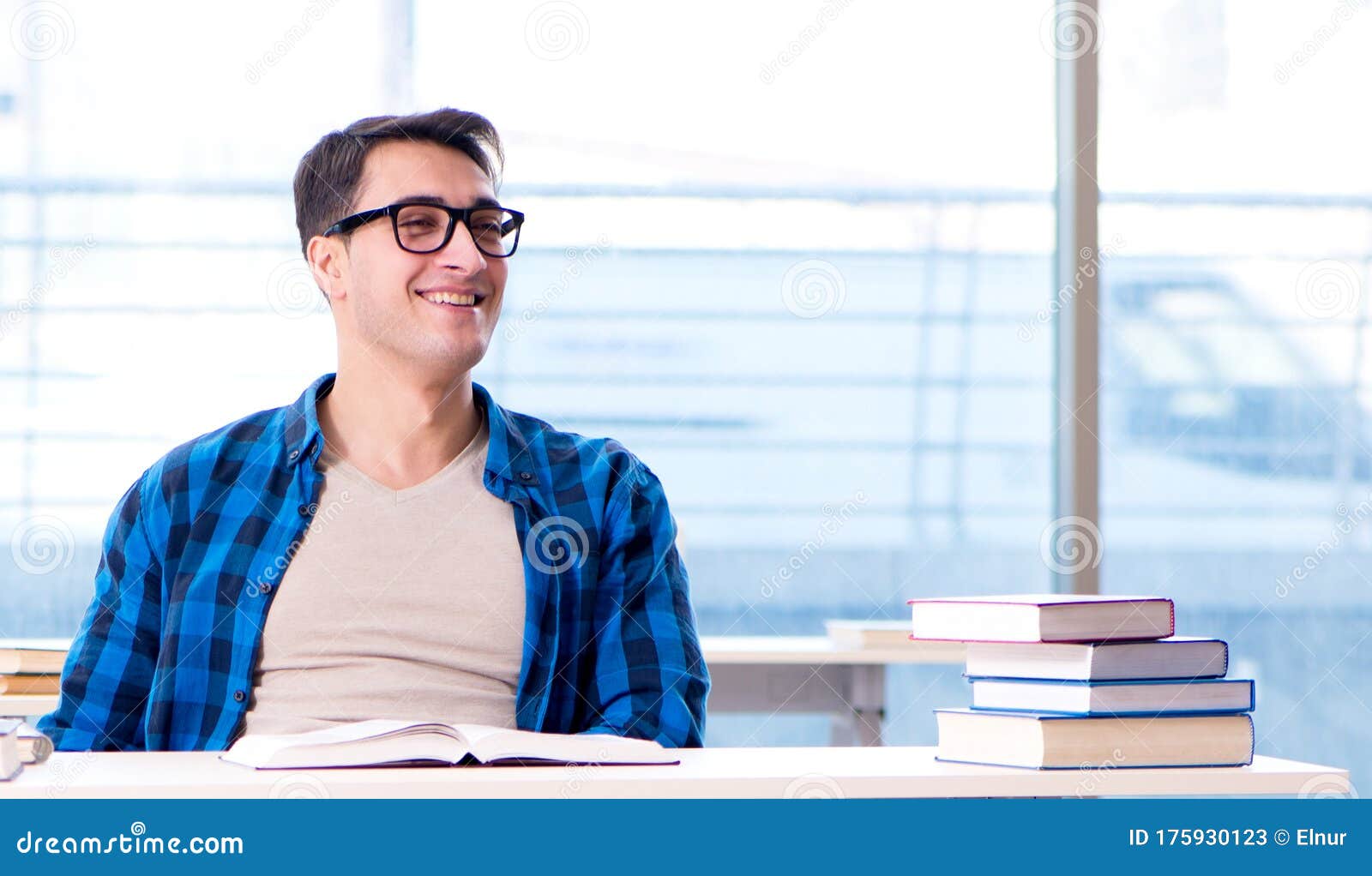 Student Studying in the Empty Library with Book Preparing for Ex Stock ...