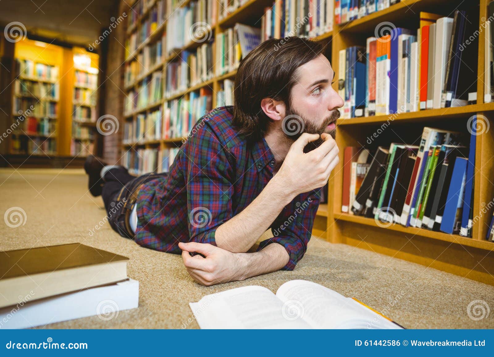 Student Studying on Floor in the Library Stock Photo - Image of male ...