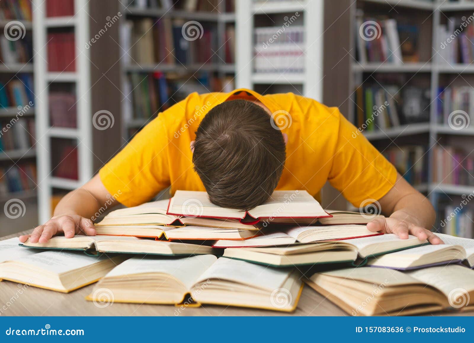 Caucasian Guy Having Nap while Studying in Library Stock Photo - Image ...
