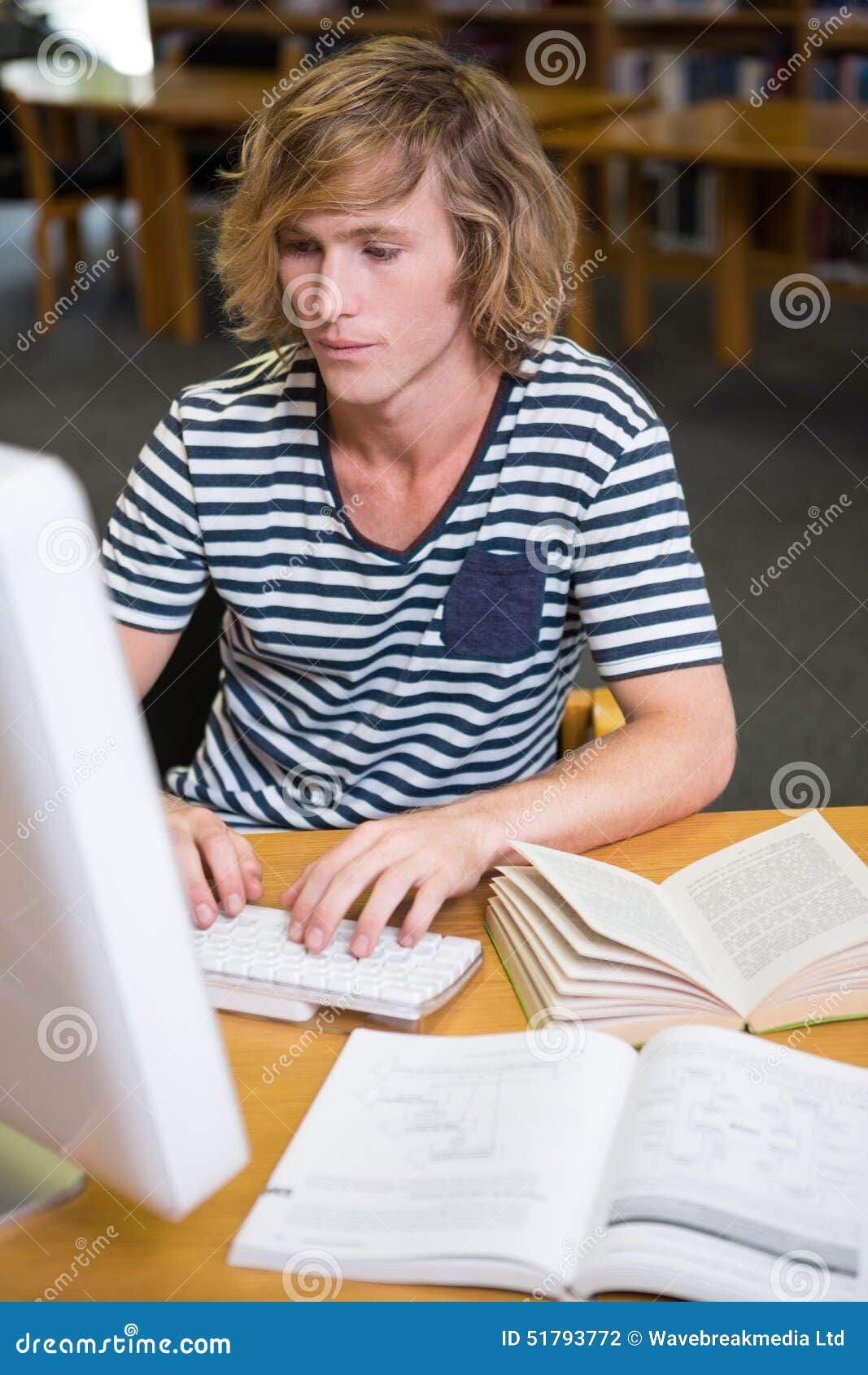 Student Studying in the Library with Computer Stock Photo - Image of ...