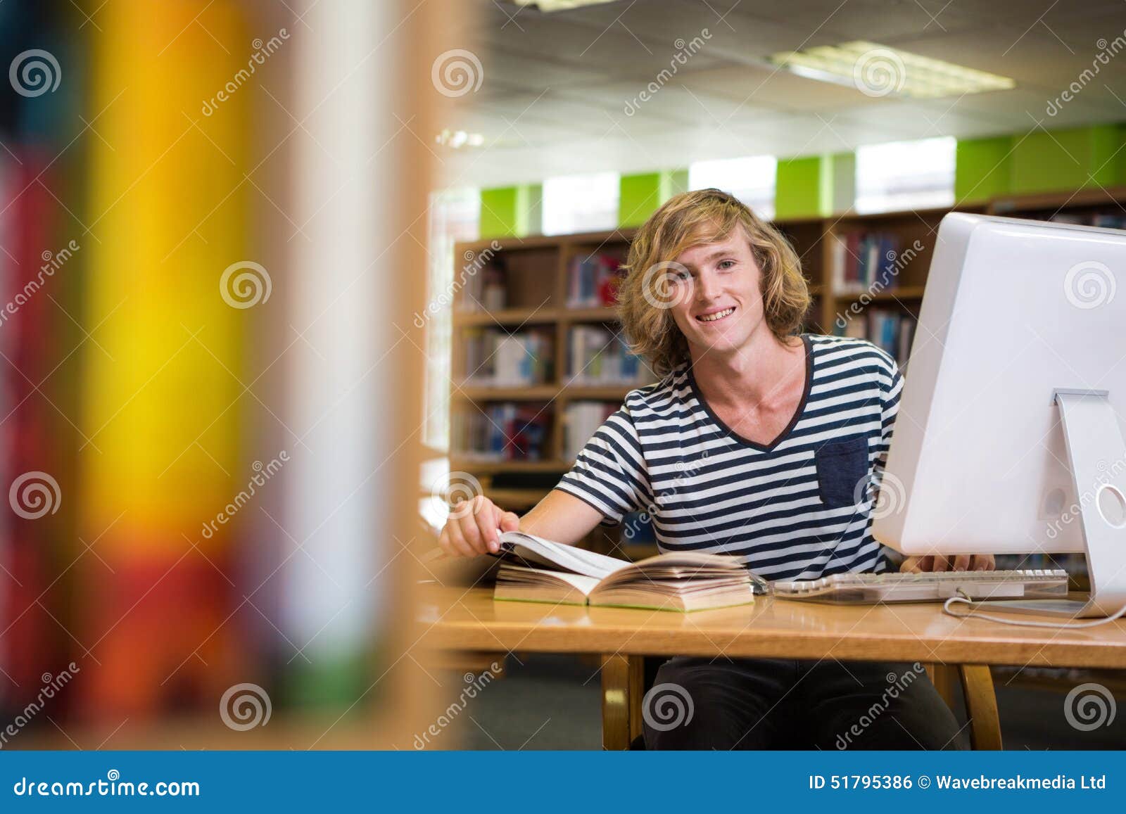 Student Studying in the Library with Computer Stock Photo - Image of ...