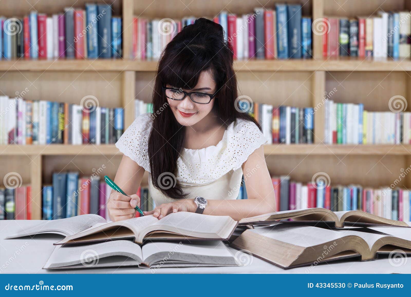 Student Studying at Library Stock Photo - Image of literature ...