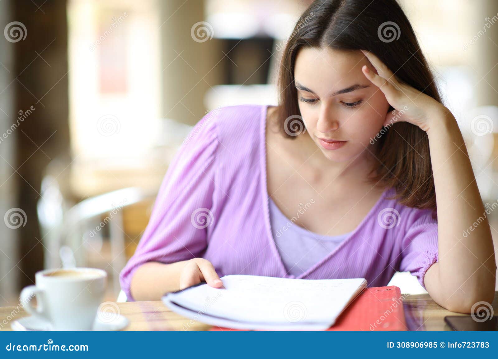 Student Studying Reading Paper Notes in a Bar Stock Image - Image of ...