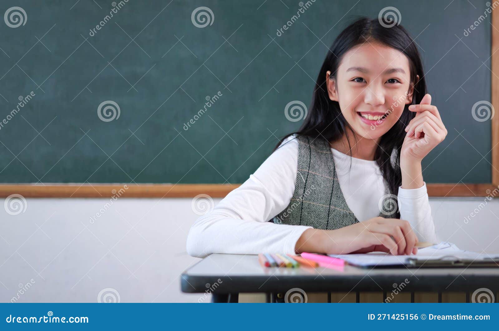 Student Studying and Reading Textbook with Happiness in Classroom Stock ...