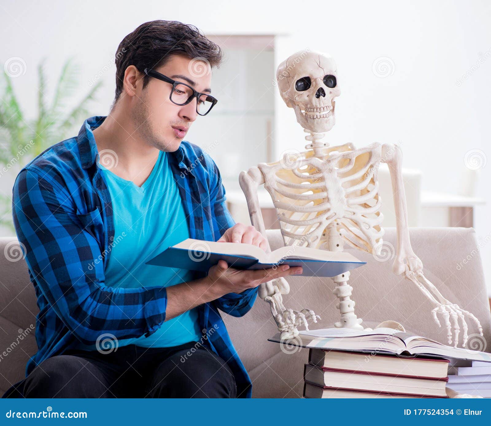 Student Studying with Skeleton Preparing for Exams Stock Photo - Image ...