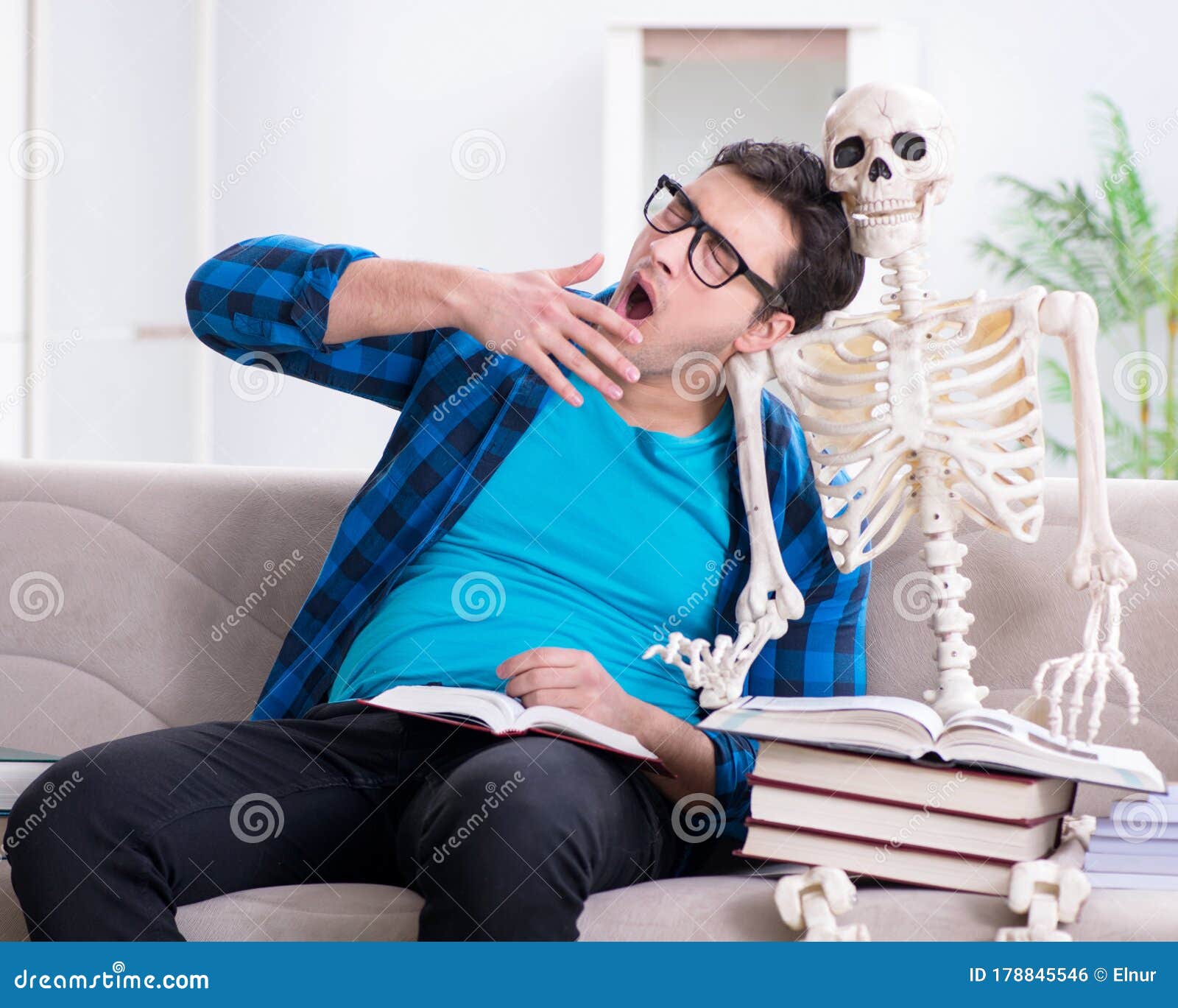 Student Studying with Skeleton Preparing for Exams Stock Photo - Image ...