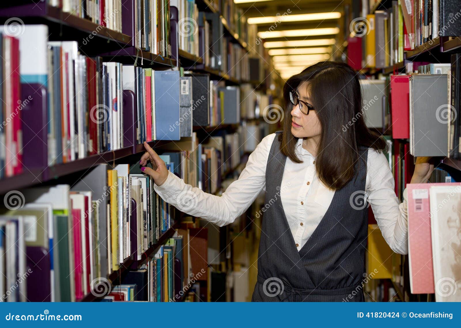 Student Surrounded by Books Stock Photo - Image of charming, portrait ...