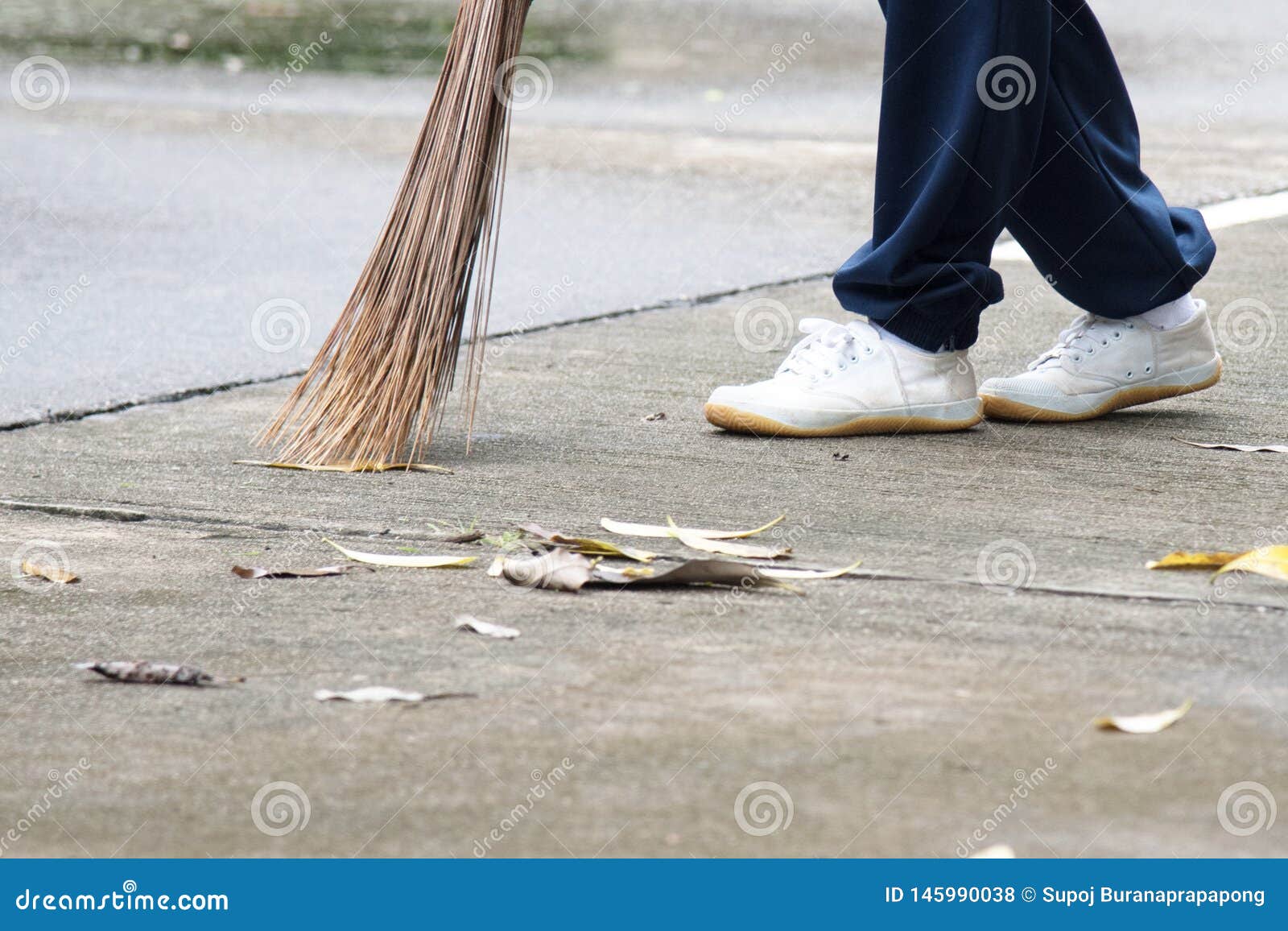 Student Sweeping Dried Leafs on the Floor in School Stock Photo - Image ...