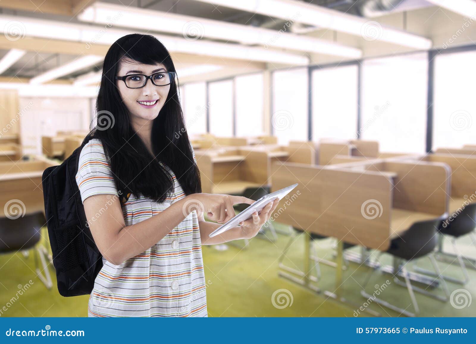 Student with a tablet stock image. Image of malaysian - 57973665
