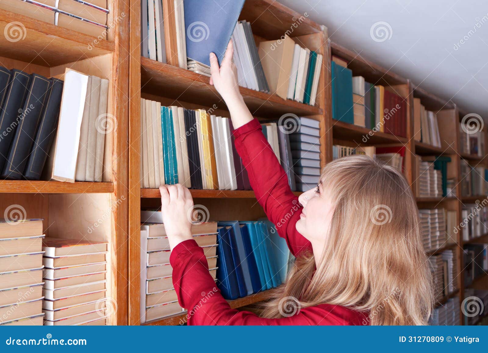 Student takes a book stock image. Image of attractive - 31270809