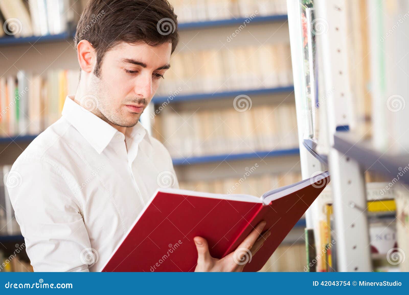 Student Taking a Book in a Library Stock Photo - Image of library ...