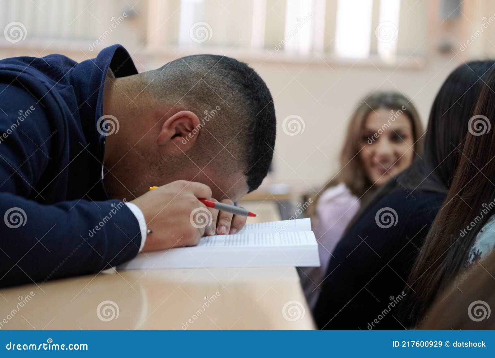 Student Taking Notes while Studying in High School Stock Image - Image ...