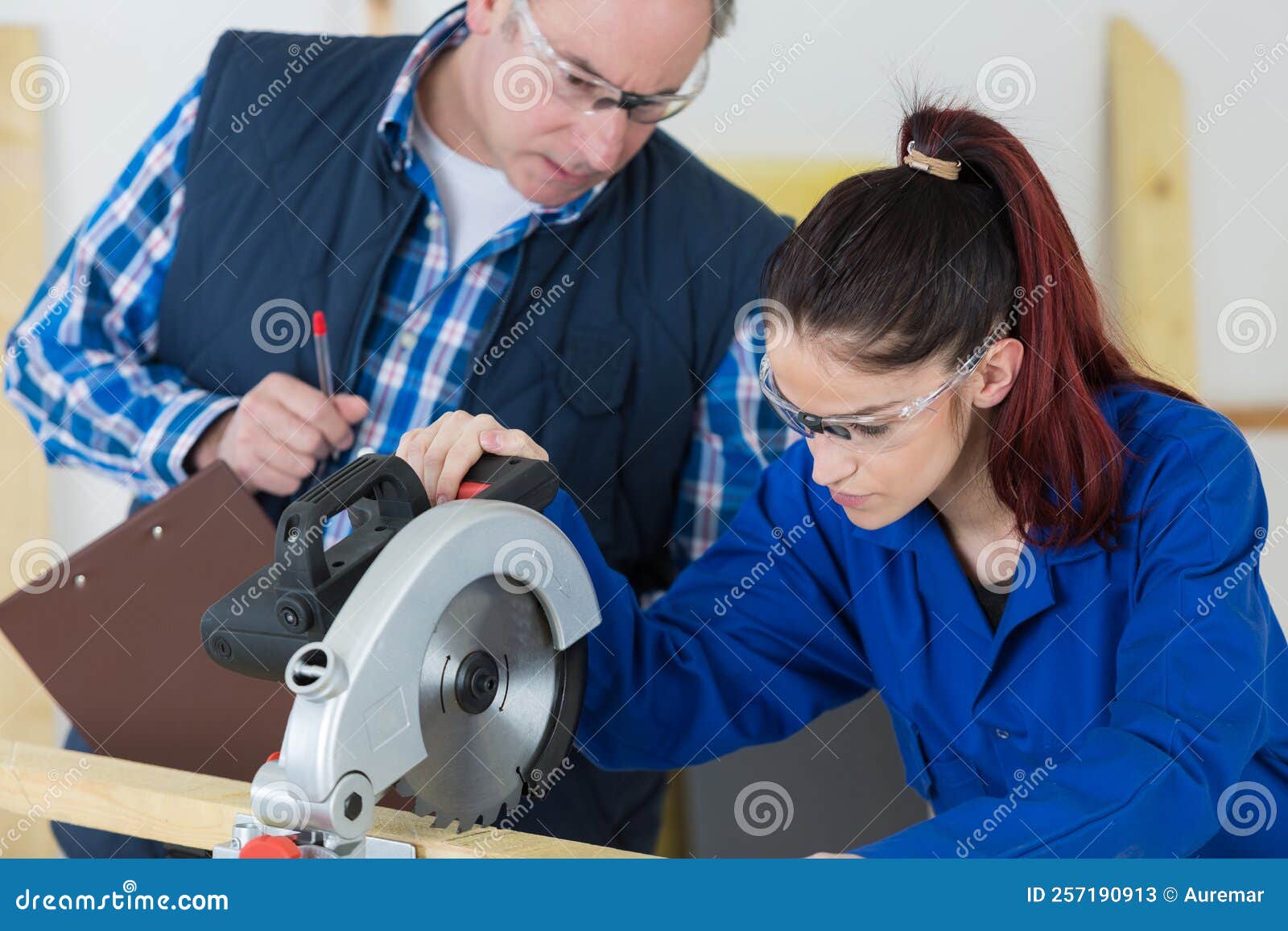 Student and Teacher in Carpentry Class Using Circular Saw Stock Image ...