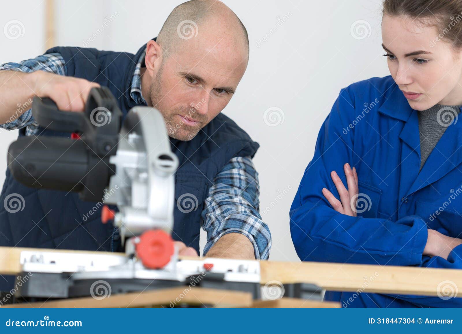 Student and Teacher in Carpentry Class Using Circular Saw Stock Photo ...
