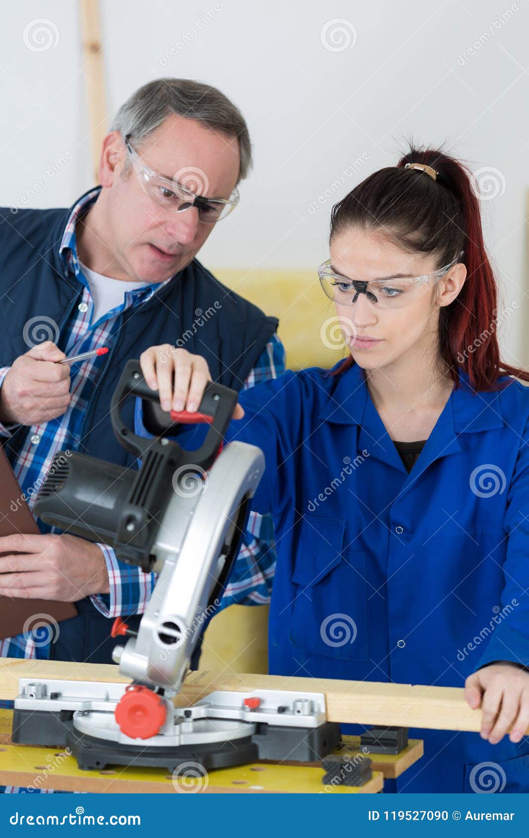 Student and Teacher in Carpentry Class Using Circular Saw Stock Photo ...