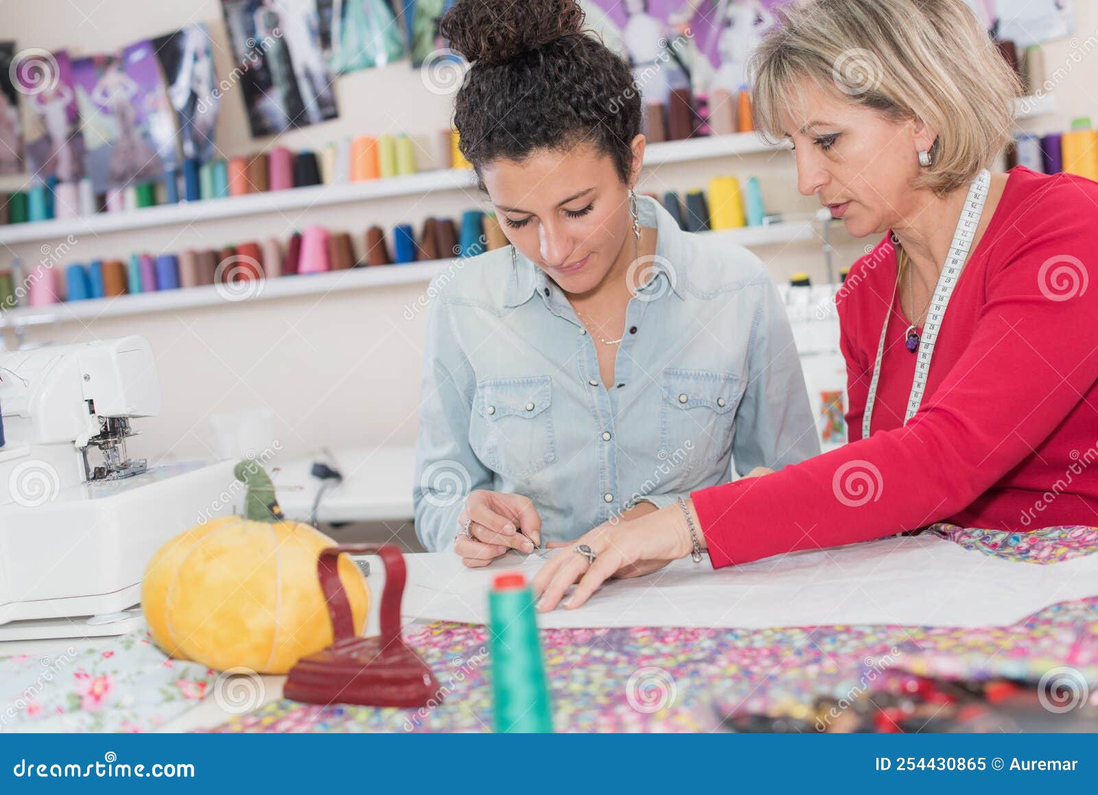 Student with Teacher in Dressmaking Class Stock Image - Image of ...