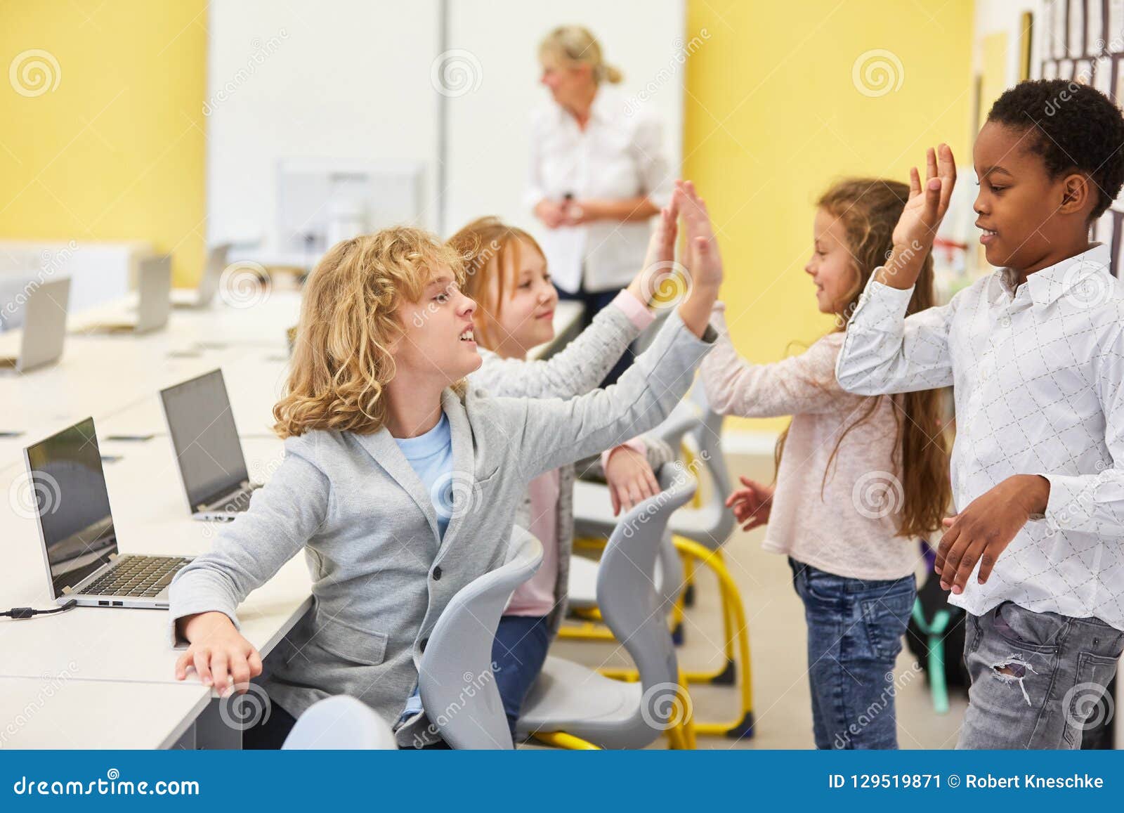 Student Team Gives Themselves a High Five Stock Image - Image of ...