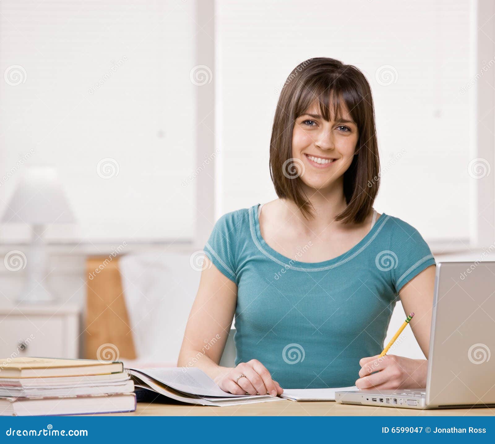 Student with Text Books Doing Homework Stock Image - Image of studying ...