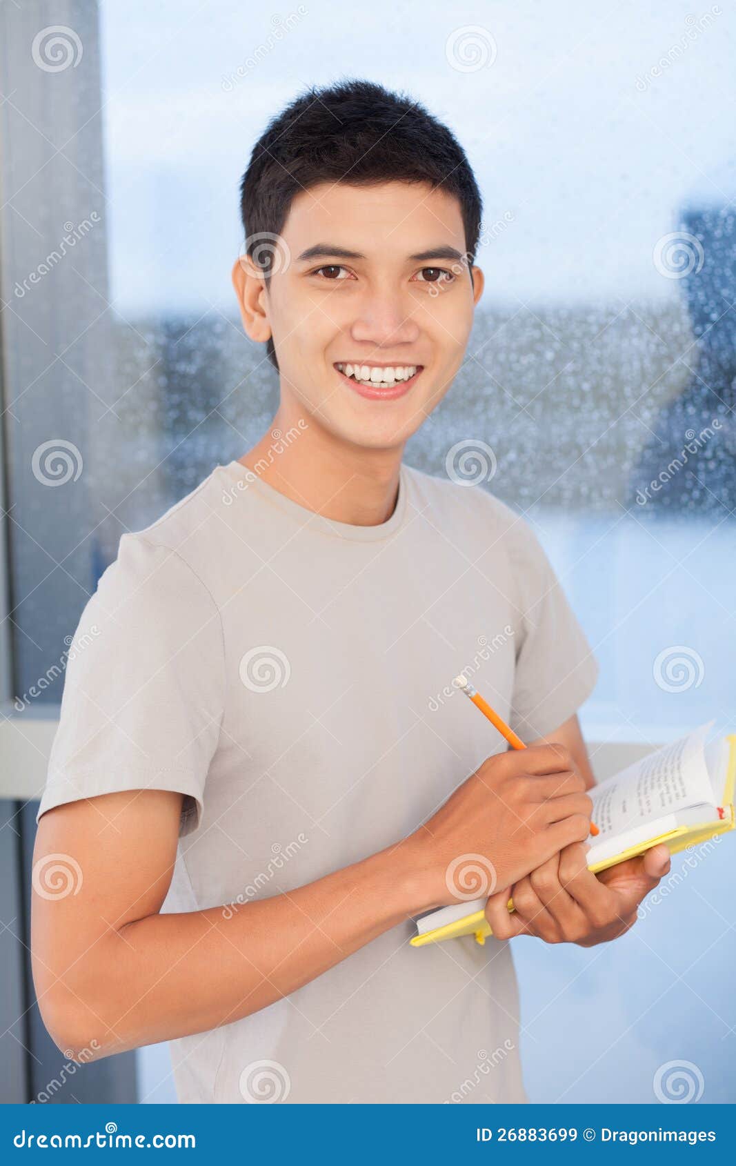 Student with textbook stock image. Image of casual, modern - 26883699